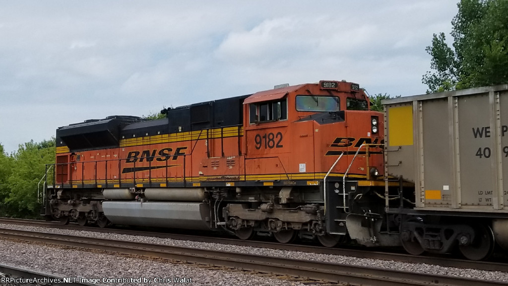 BNSF #9182 is in DPU service behind a east bound U.P. coal train.
